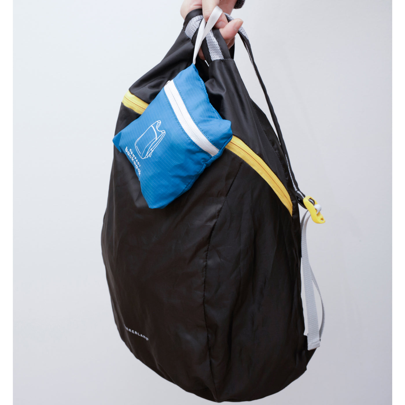Packable Black/Yellow Compact Backpack for Travel — Kikkerland Design Inc